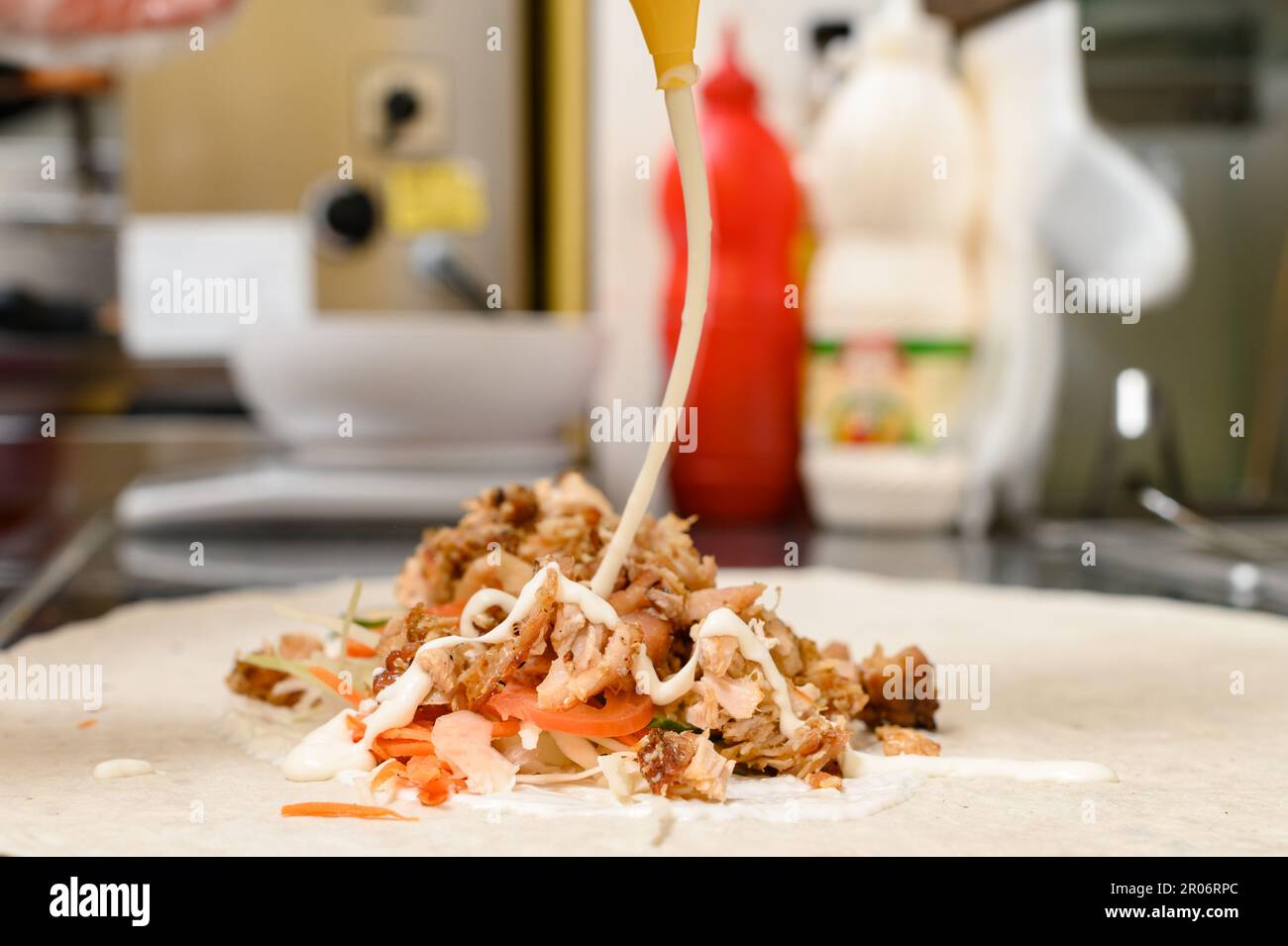 Shawarma preparation in a fast food restaurant, vegetable and meat ...