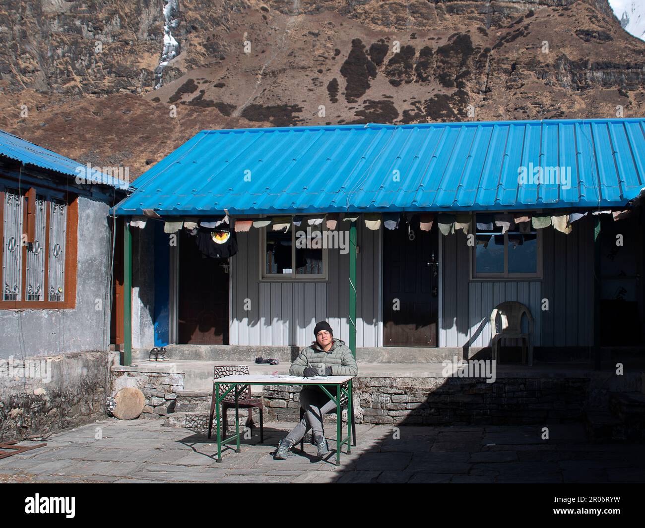 Female backpacker looking melancholic in Machhapuchhare Base camp ...
