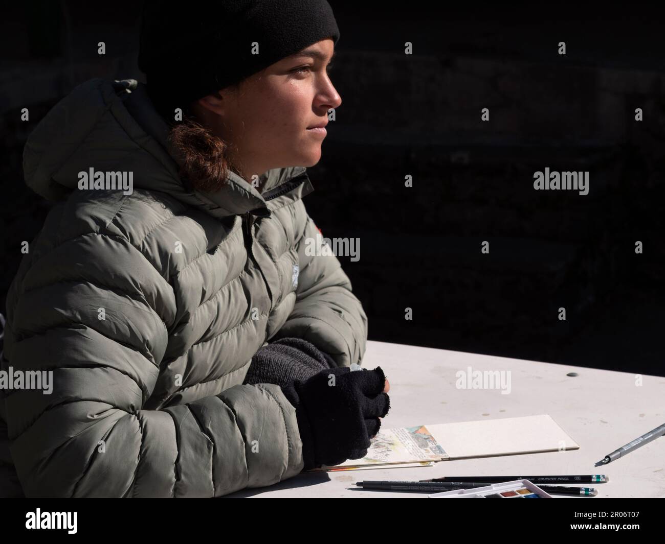 Female backpacker looking melancholic in Machhapuchhare Base camp ...