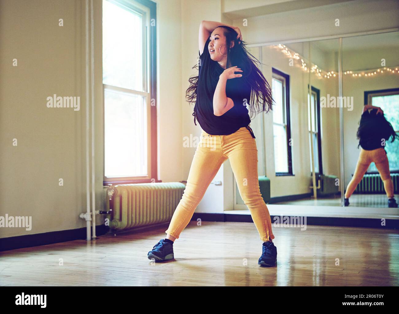 Dance - Heart first, feet second. a young woman dancing in a studio ...