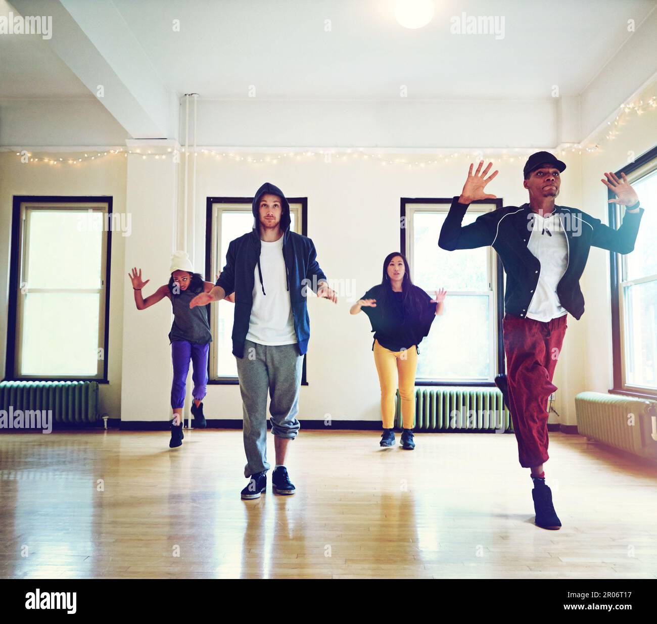 Dominating the dance industry with their moves. a group of young people ...