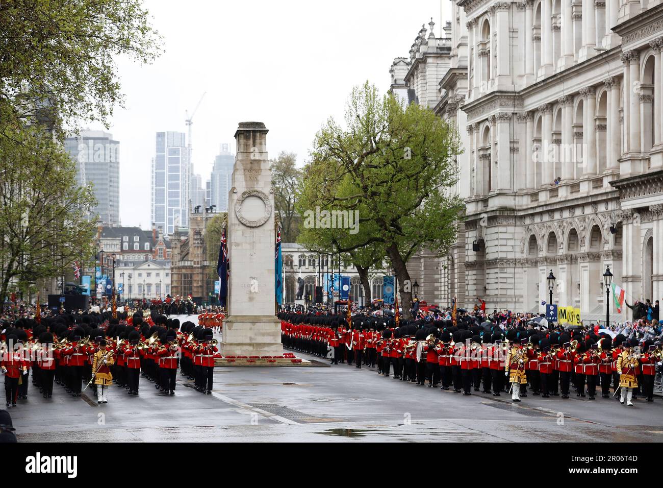 Soldiers march in a procession through Whitehall after the coronation ...