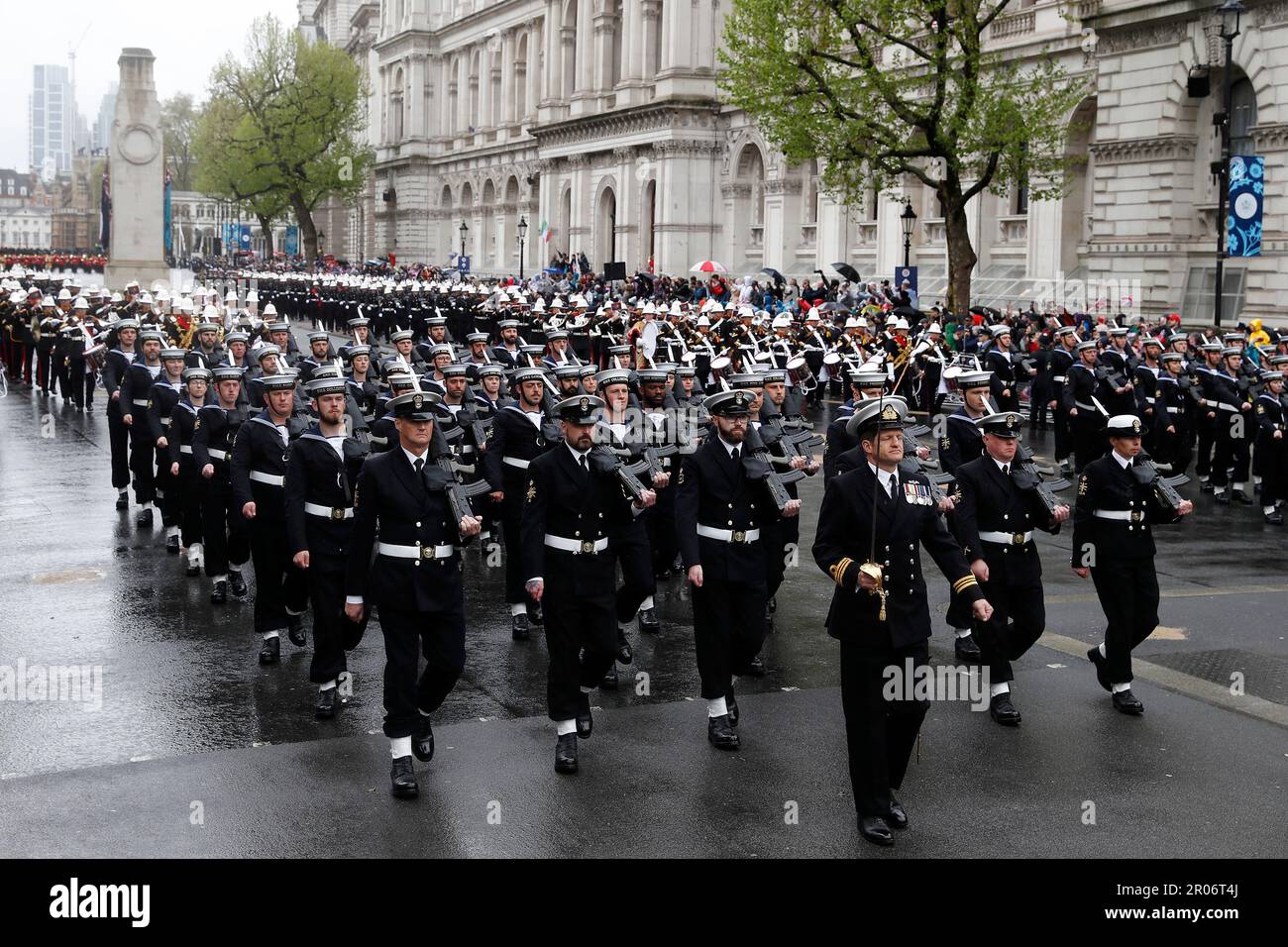 Soldiers march in a procession through Whitehall after the coronation ...