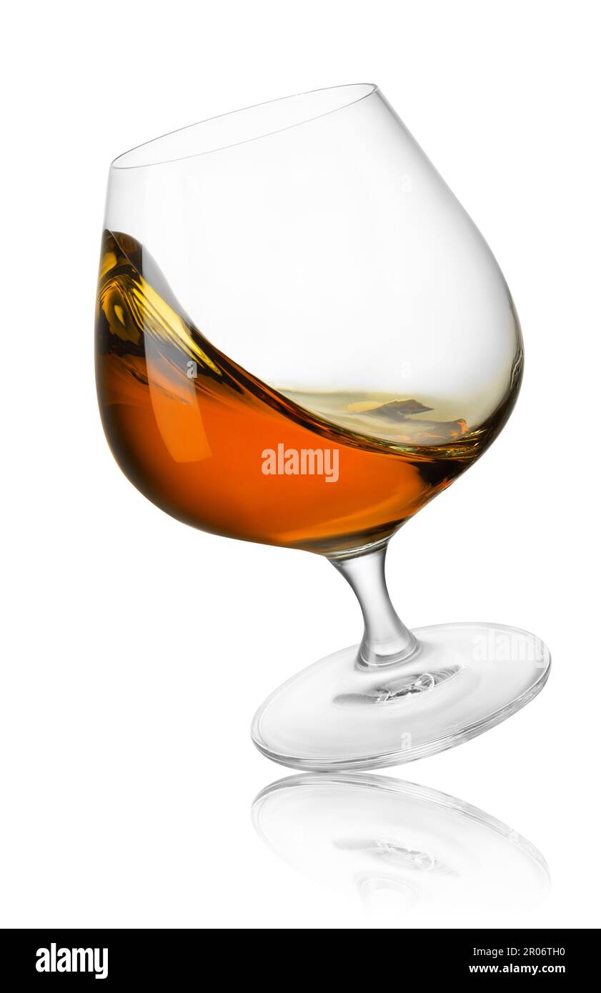 falling glass of cognac with splash isolated on white Stock Photo - Alamy