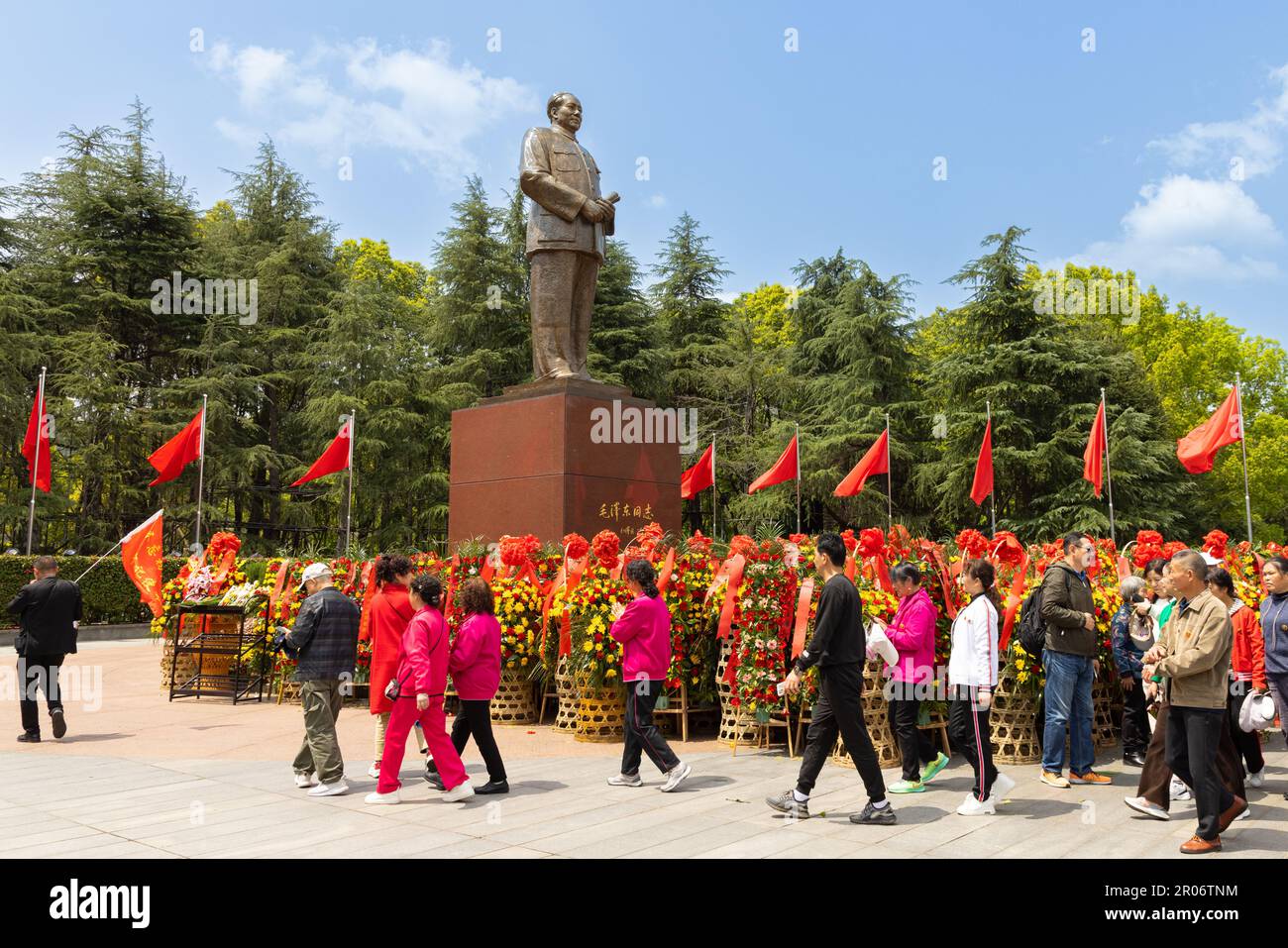 7 4 2023 Chinese tourists, school students visit a statue of Mao Zedong ...