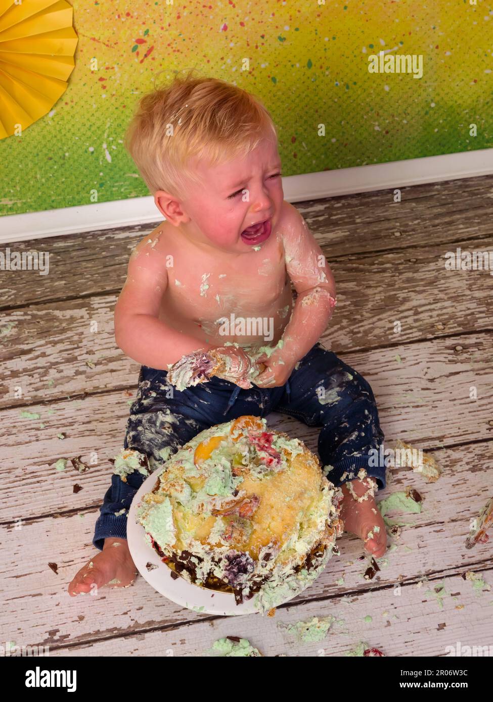 Colorful images shot during the first birthday party of a little blonde ...