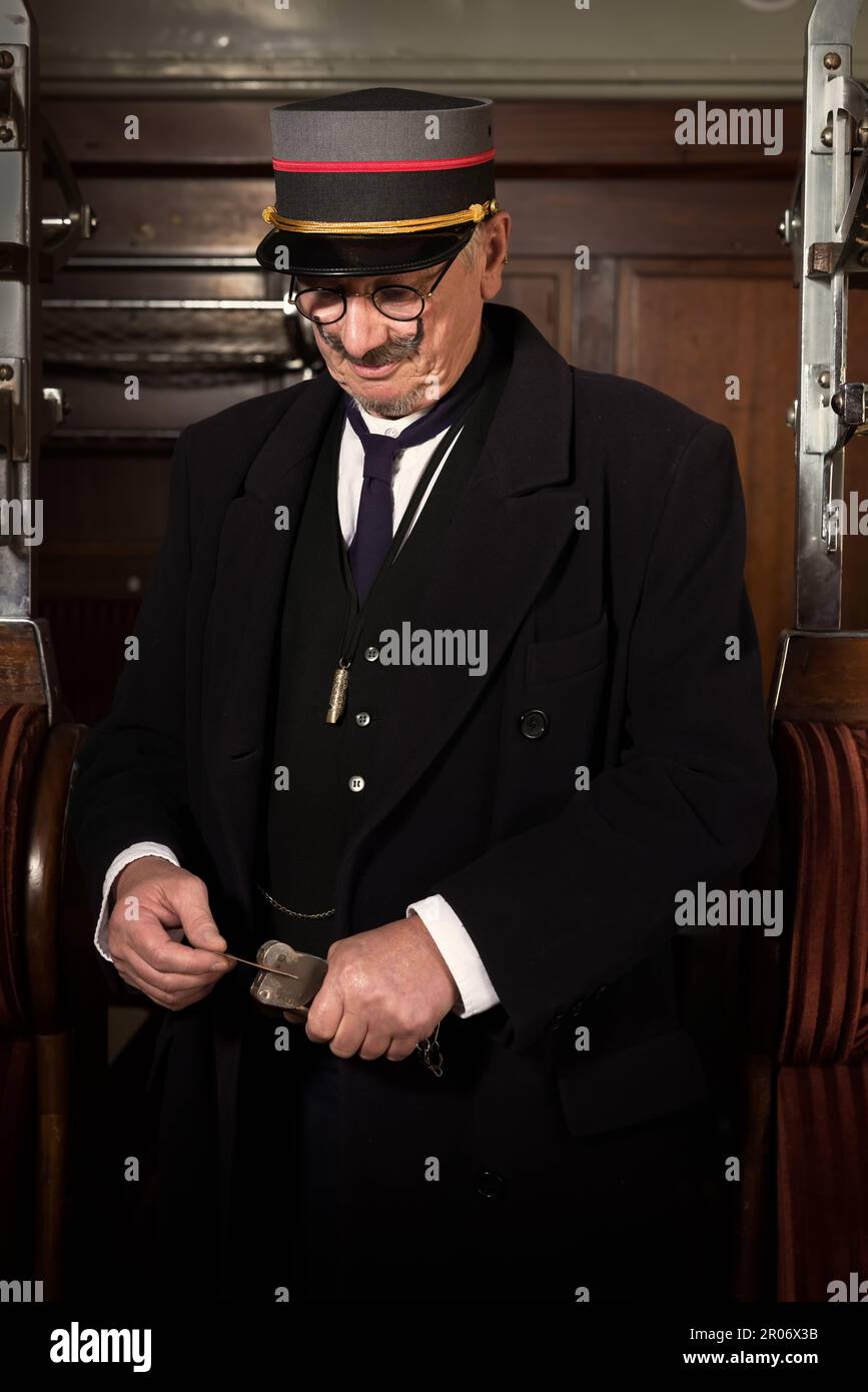 Reenactment scene of a vintage steam train conductor in a 1927 ...