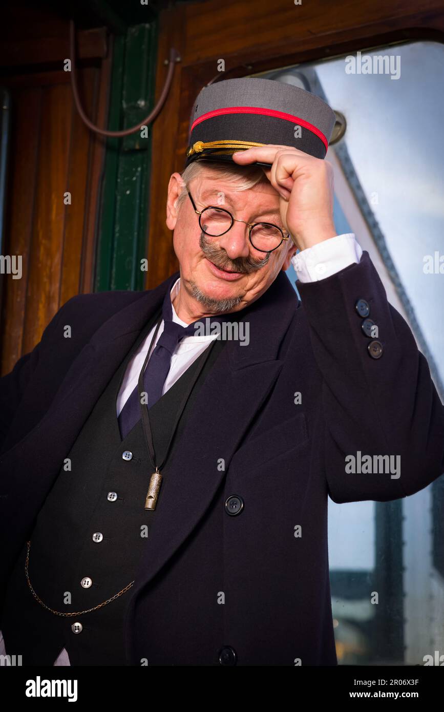 Reenactment scene with authentic 1927 1st class train carriage and a ...