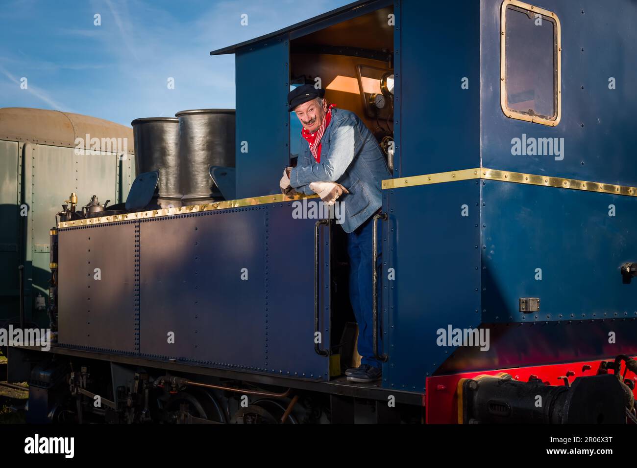 Reenactment scenes of a vintage worker or machinist in an authentic ...