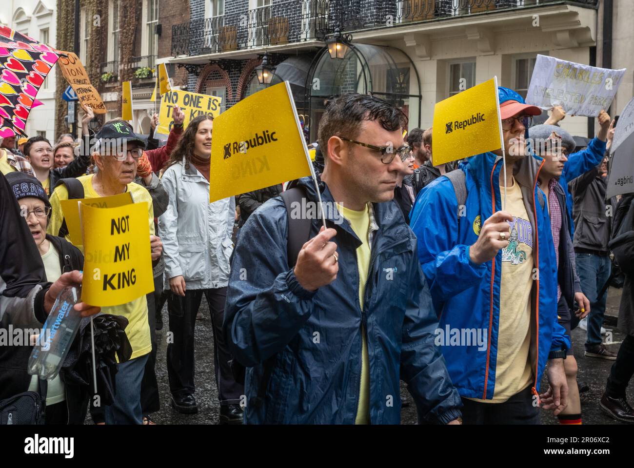 Anti-monarchy and republican protestors demonstrate with a large banner ...