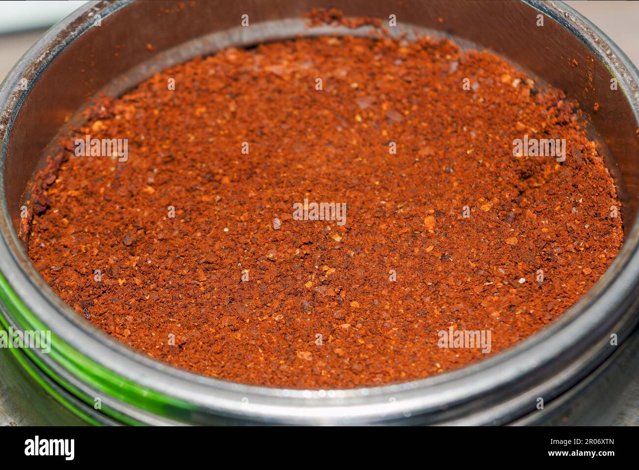 Freshly ground coffee in a geyser coffee maker close-up. Texture of ...