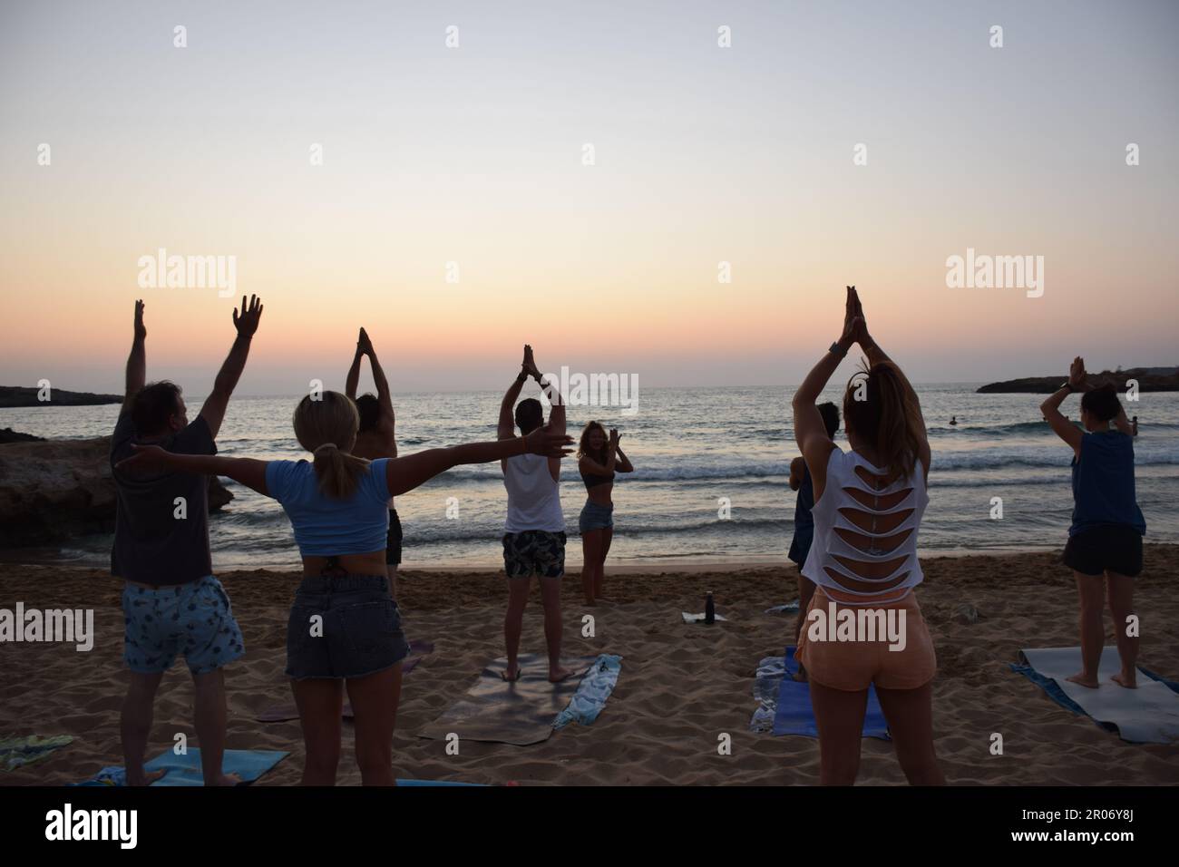 yoga on the beach in Greece, tYoga retreat, group yoga class on the ...