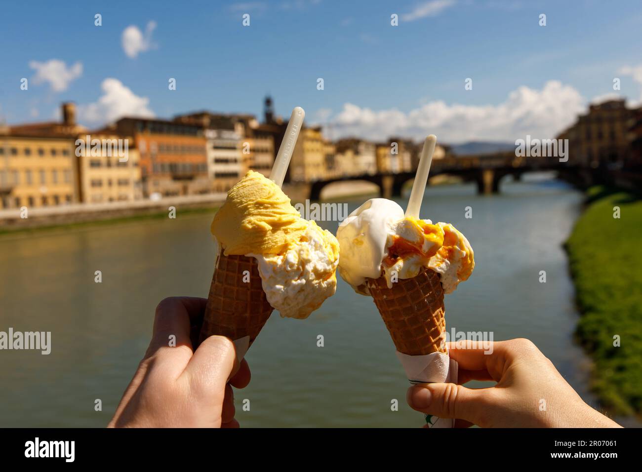 Traveling as a couple. Two cones of Italian ice cream on the city ...