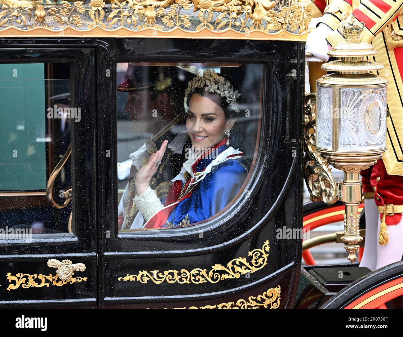 The Princess of Wales waves to the crowds as the Coronation Procession ...