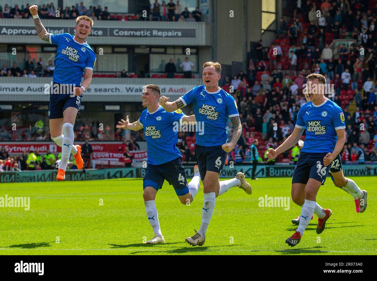 Peterborough United players celebrate after finishing in the playoffs ...