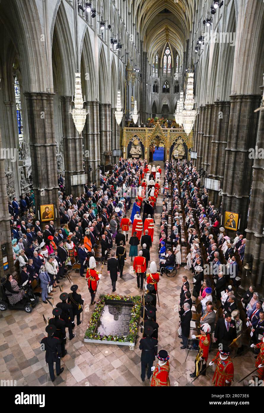 King Charles III and Queen Camilla (top) arrive at Westminster Abbey in ...