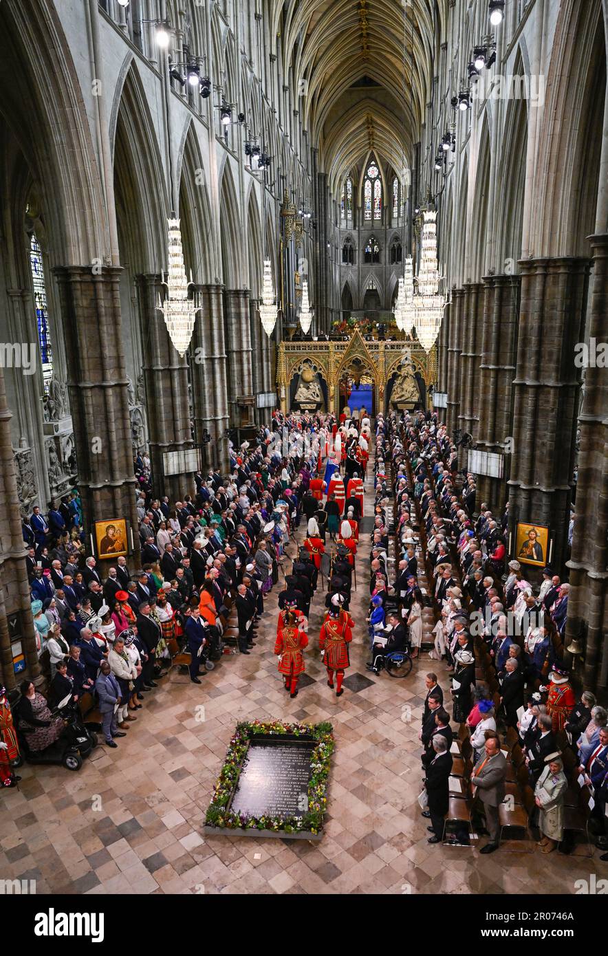 Queen Camilla (top) and King Charles III arrive at Westminster Abbey in ...