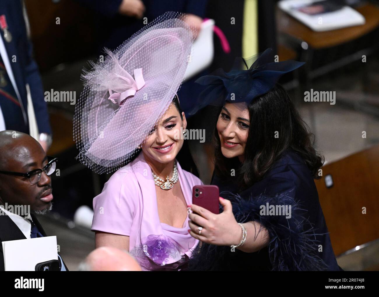 Katy Perry and Nadia El-Nakla (right) take a selfie during the ...