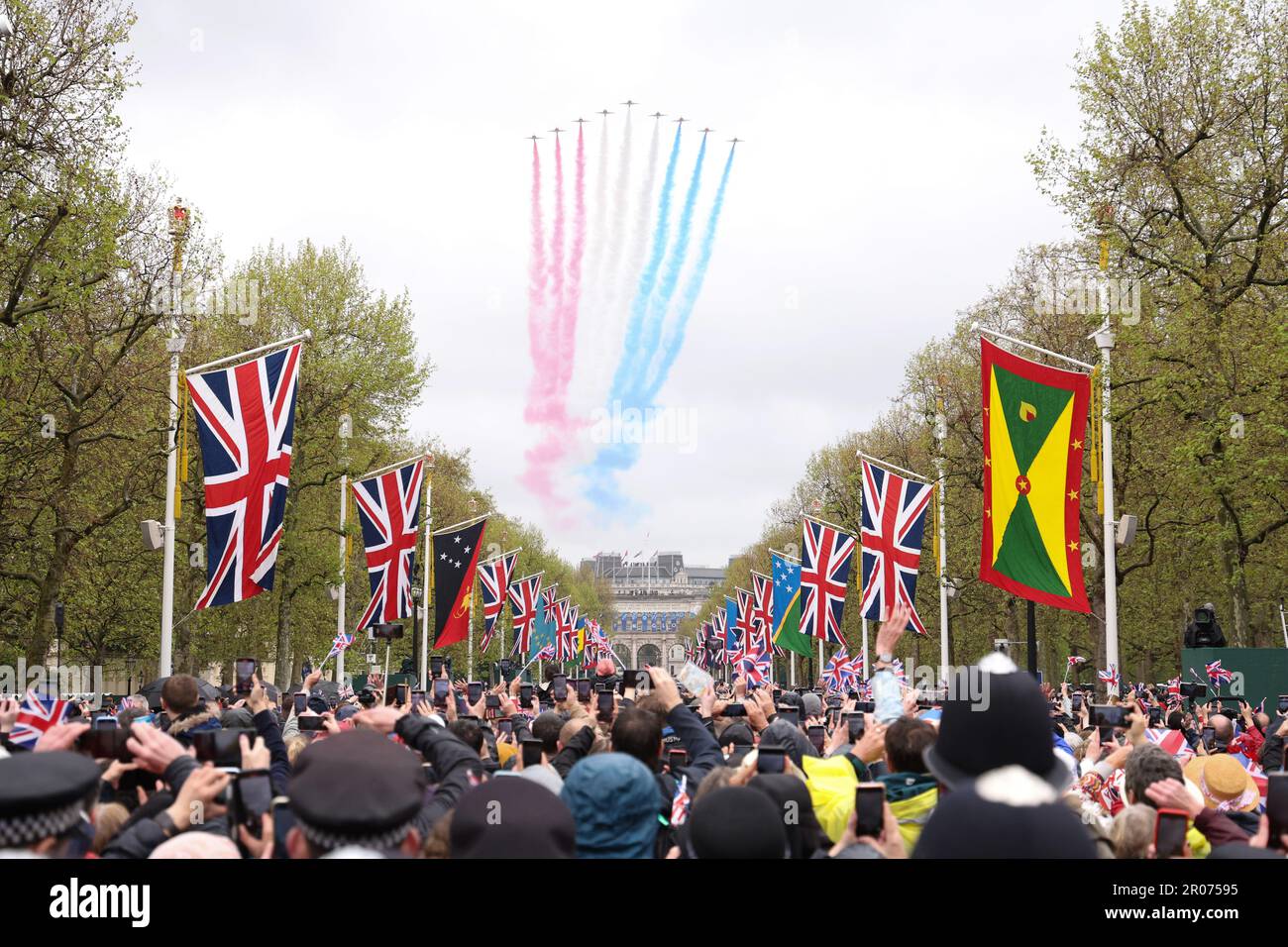 A general view of a flypast by aircraft from the Red Arrows over London ...