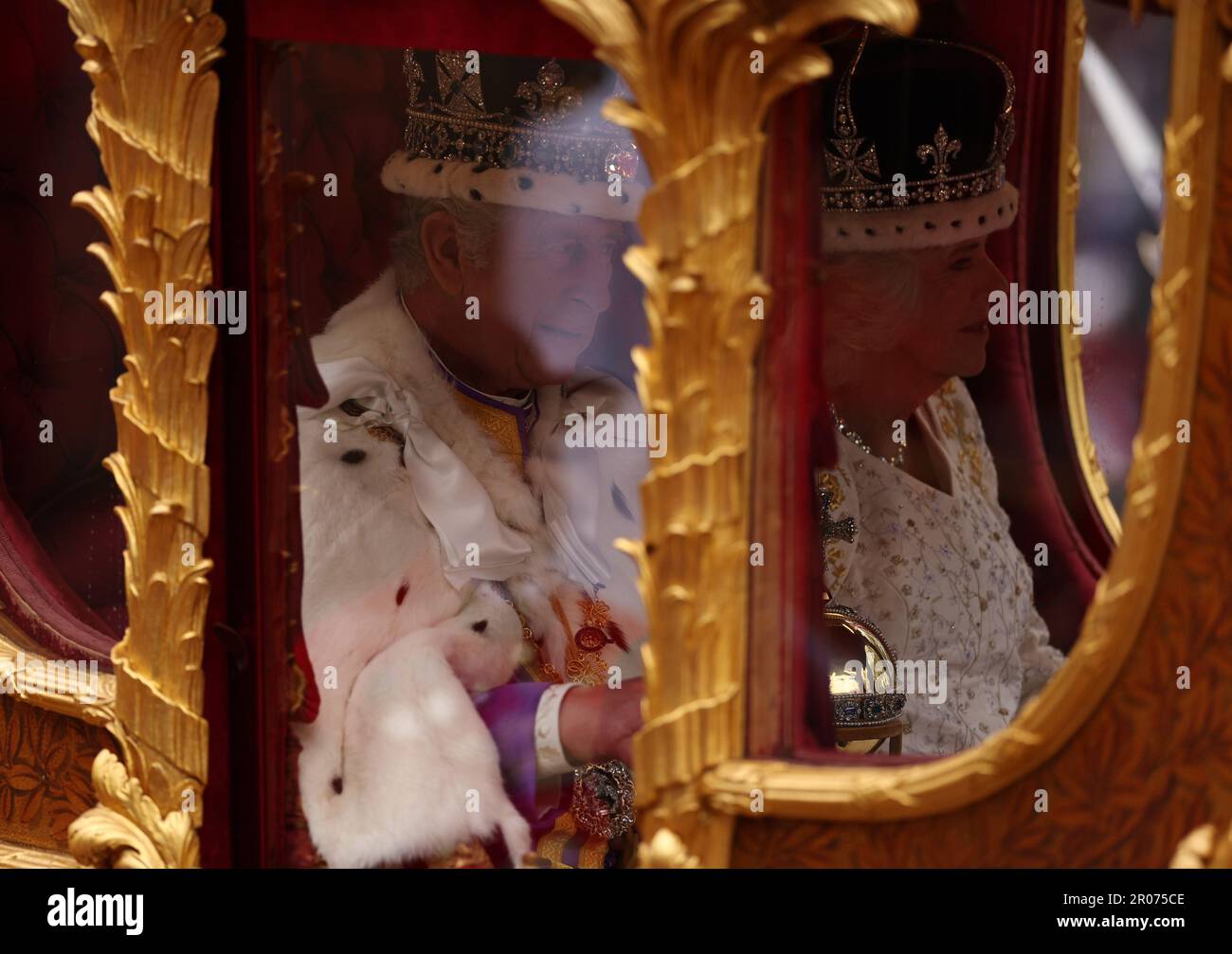 King Charles III and Queen Camilla are carried in the Gold State Coach ...