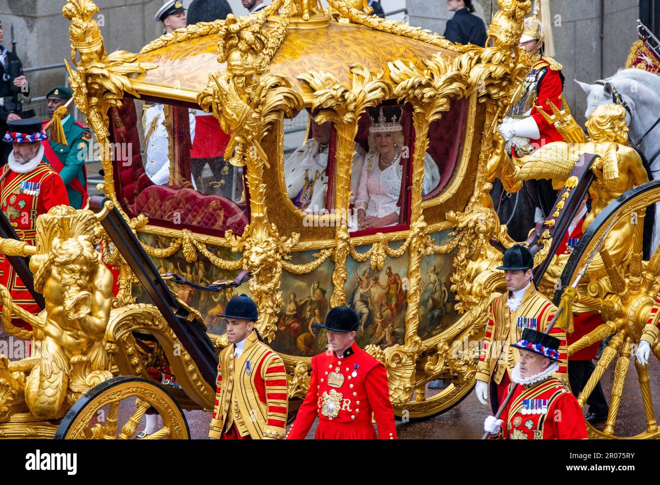 King Charles III and Queen Camilla are carried in the Gold State Coach ...