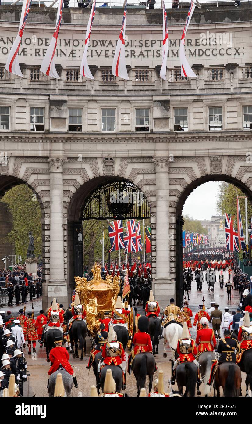 King Charles III and Queen Camilla are carried in the Gold State Coach ...