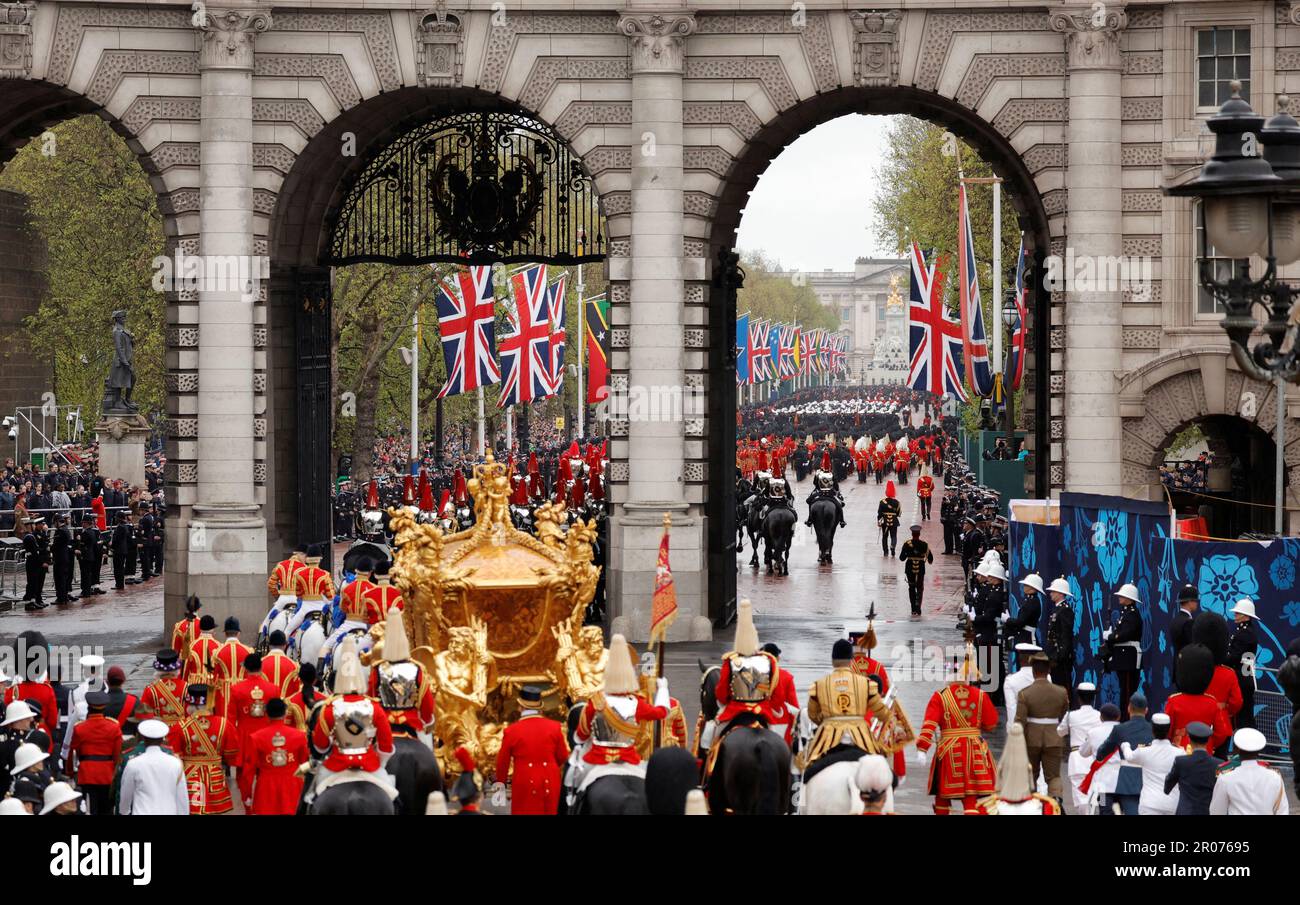 King Charles III and Queen Camilla are carried in the Gold State Coach ...