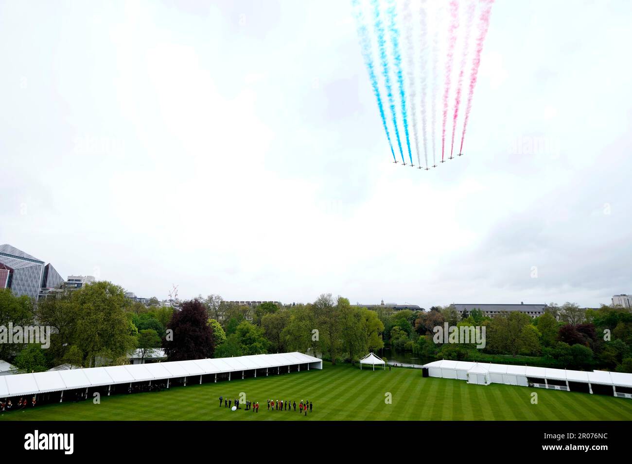 The Red Arrows fly over Buckingham Palace following the coronation of ...