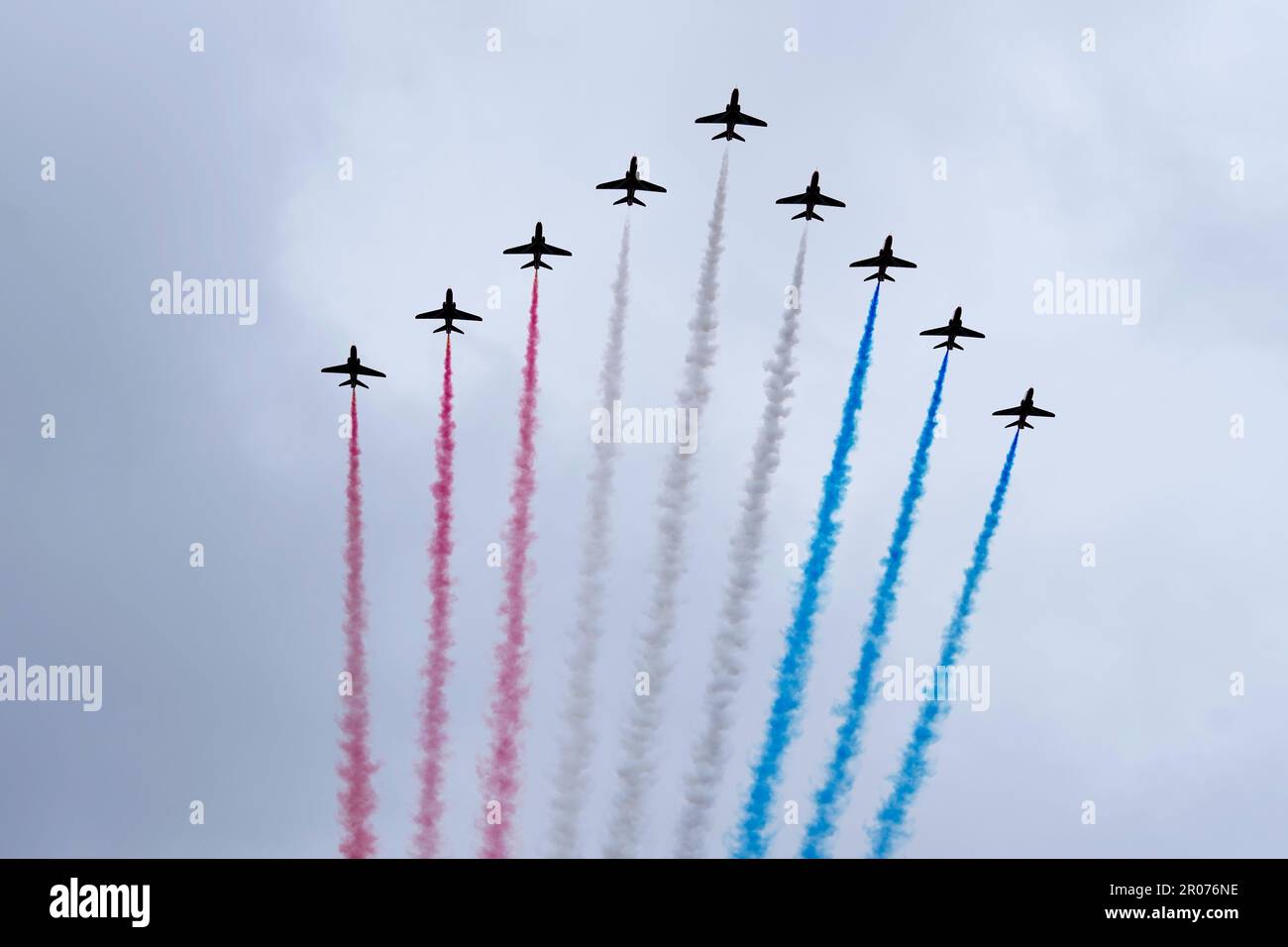 The Red Arrows fly over Buckingham Palace following the coronation of ...