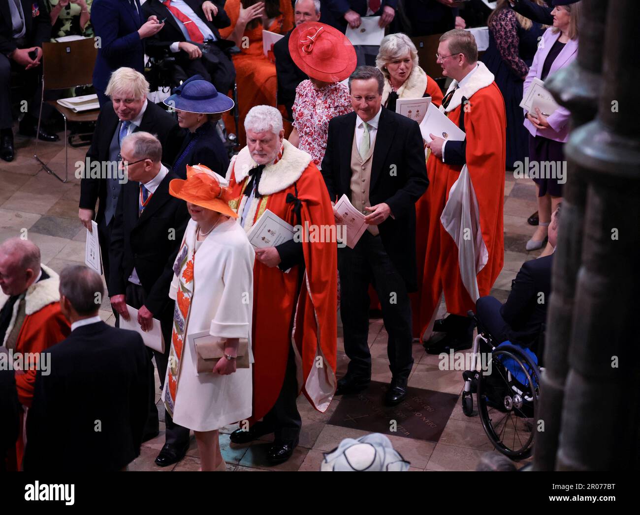 Former prime ministers Boris Johnson and David Cameron depart following ...