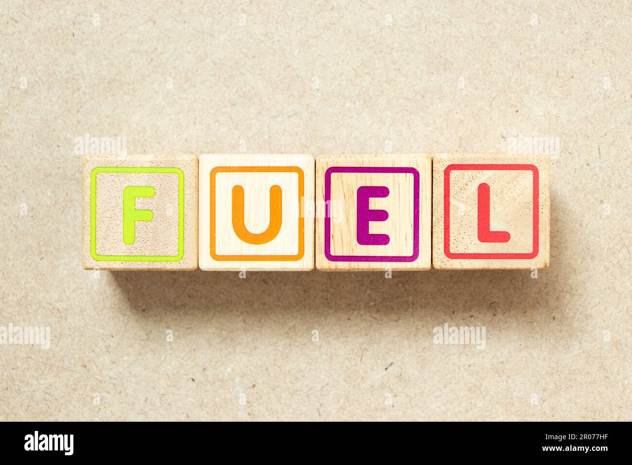 Wooden alphabet letter block in word fuel on wood background Stock ...