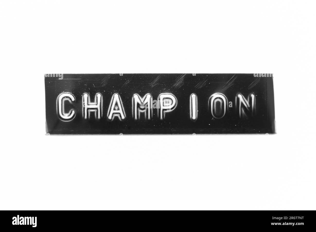 Black color banner that have embossed letter with word champion on ...