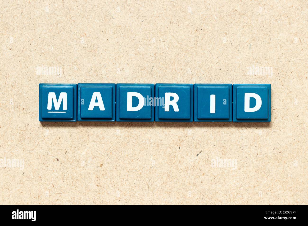 Tile alphabet letter in word madrid on wood background Stock Photo - Alamy
