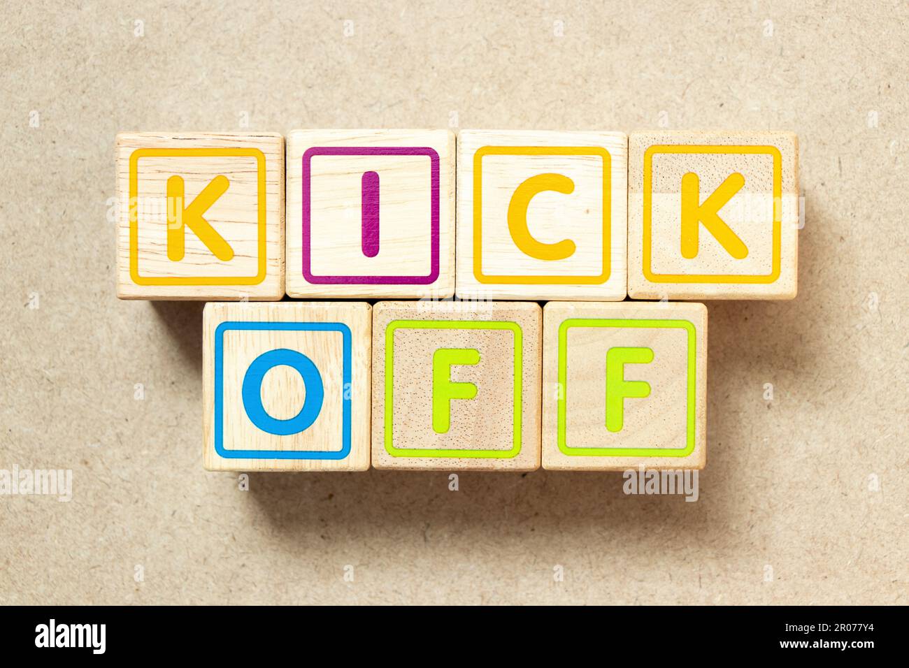 Wooden alphabet letter block in word kick off on wood background Stock ...