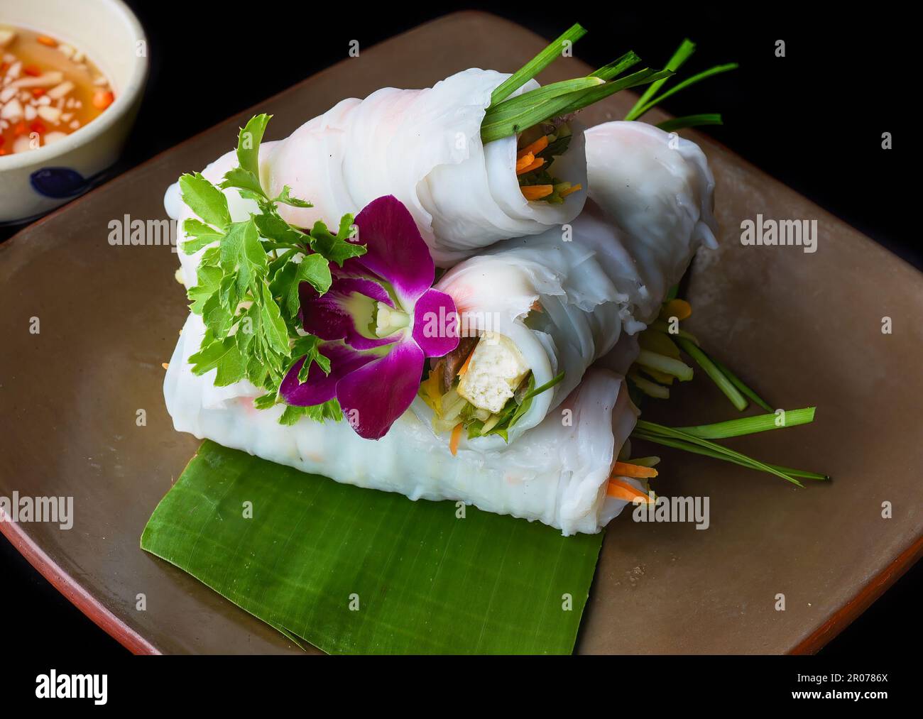 Vietnamese Pho spring roll with seafood, tofu, vegetables isolated on ...