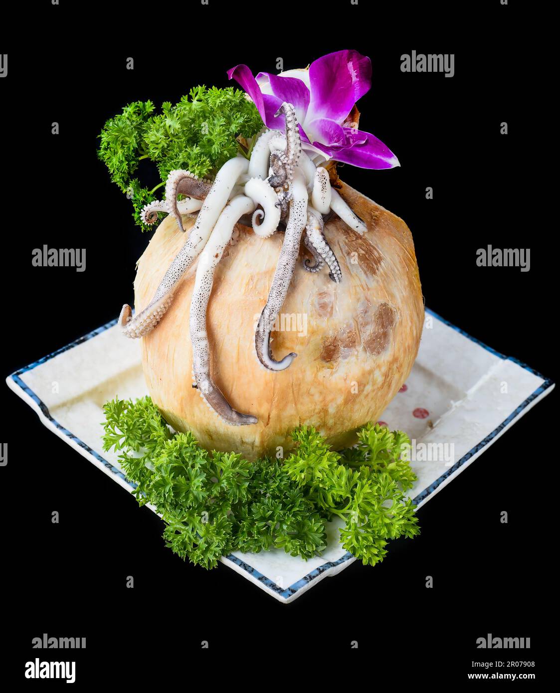 Vietnamese squid cocktail with squid meat in coconut isolated for a ...