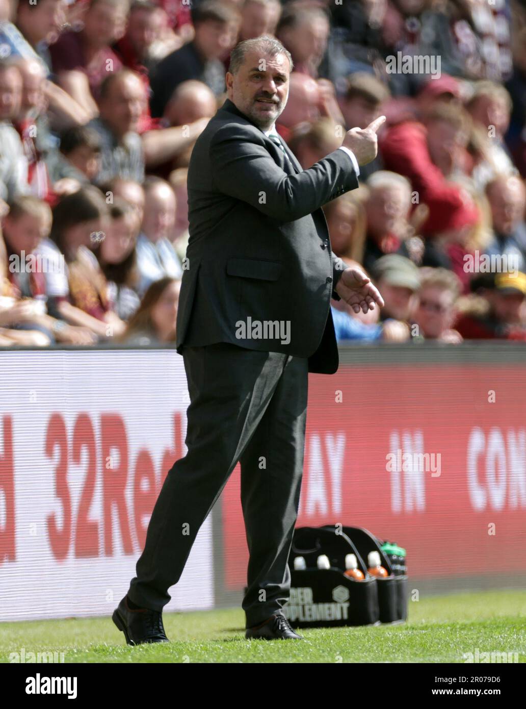 Celtic manager Angelos Postecoglou gestures on the touchline during the ...