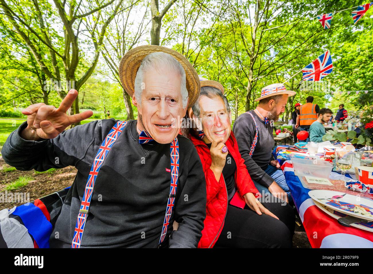 London, UK. 7th May, 2023. A group of londoners bring a german friend ...