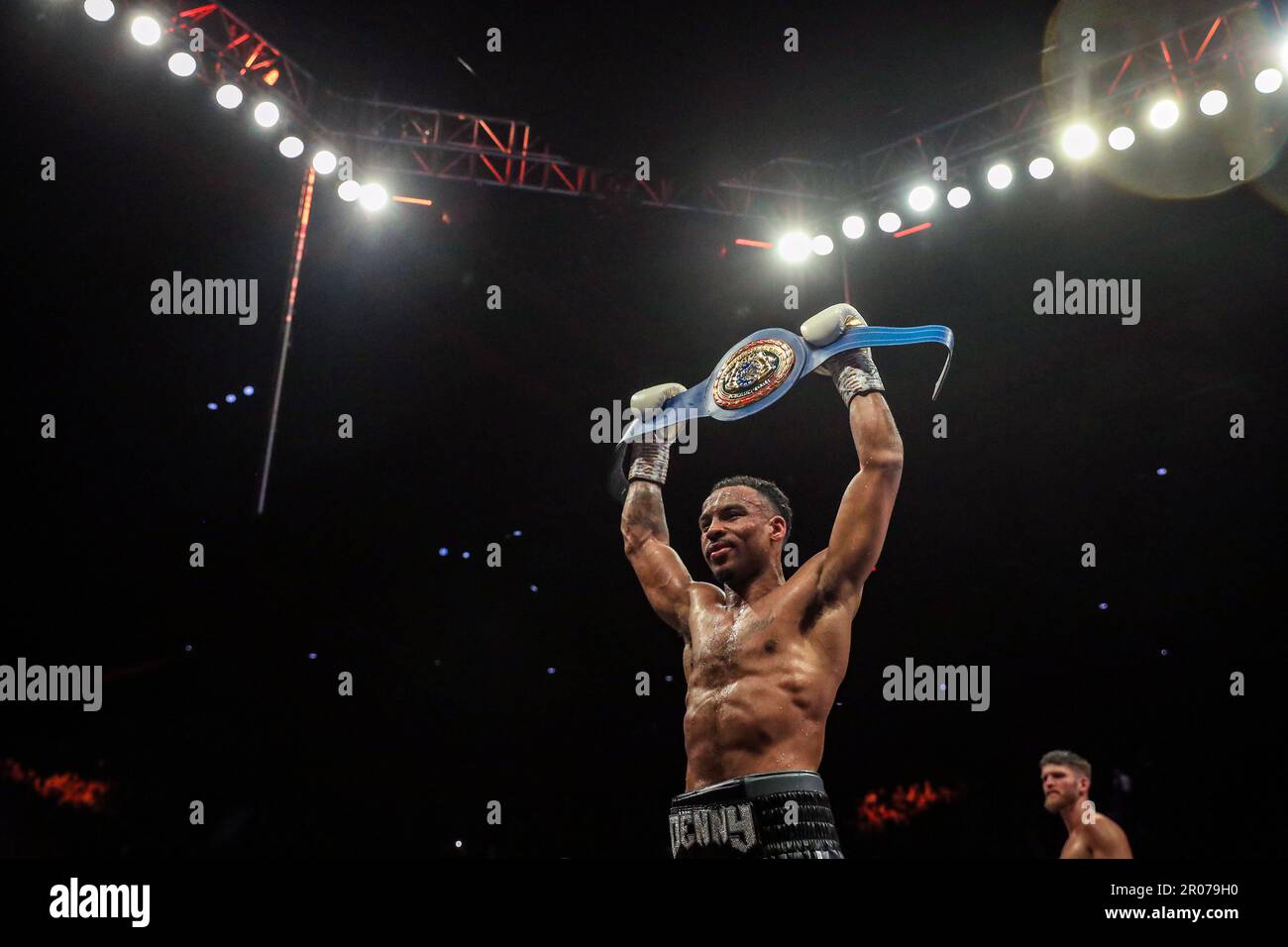Tyler Denny celebrates victory against Macauley McGowan in the Vacant ...