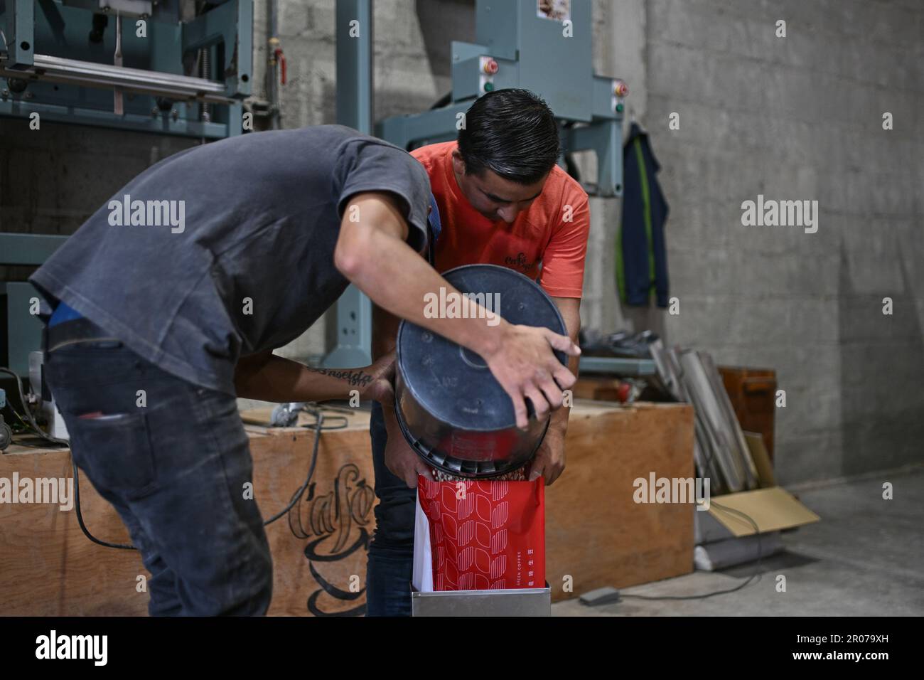 Marcala, Honduras. 6th May, 2023. Workers pack coffee beans in a coffee ...
