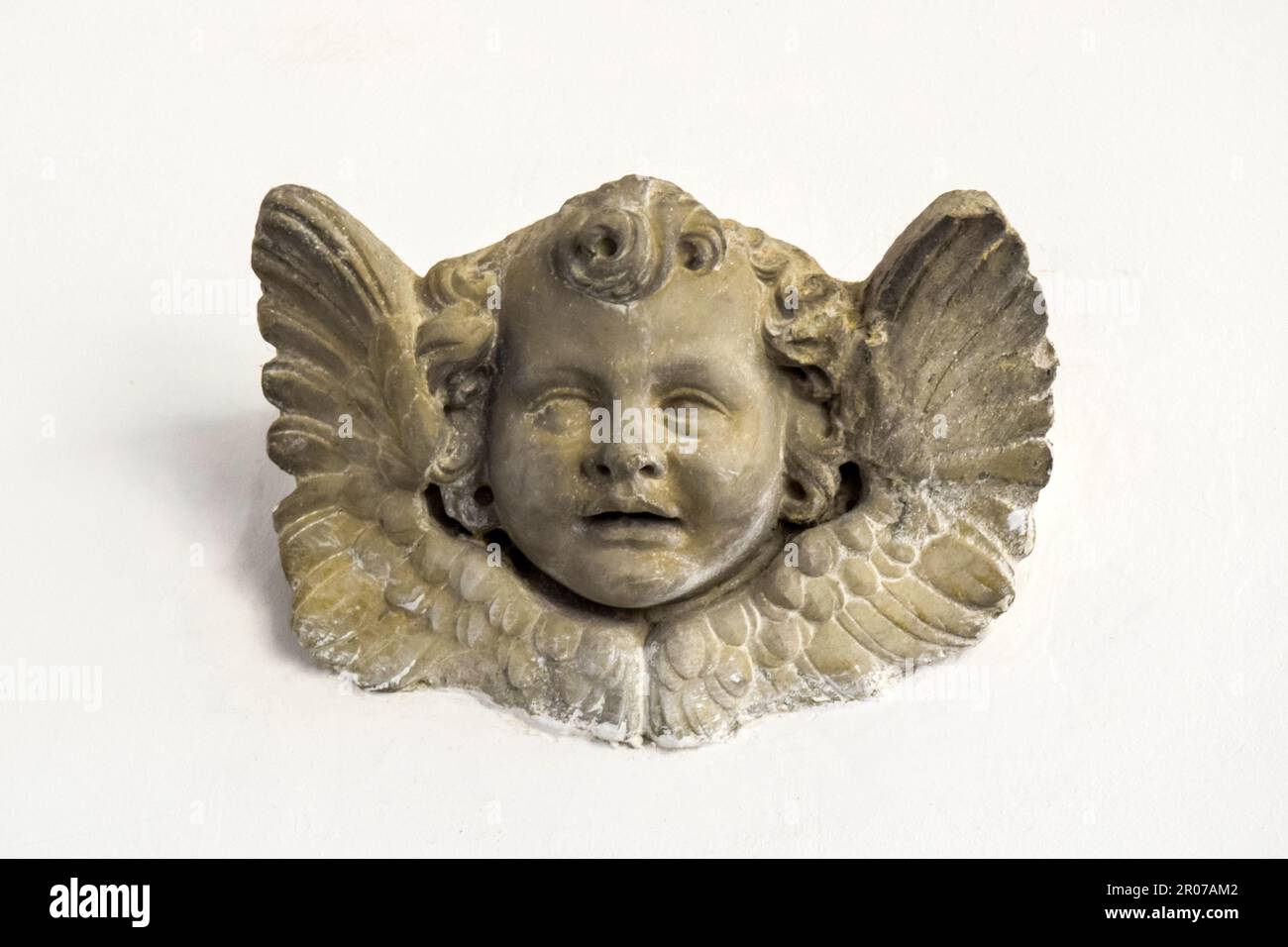 Beautiful angel as a bas relief wall sculpture, details, closeup ...