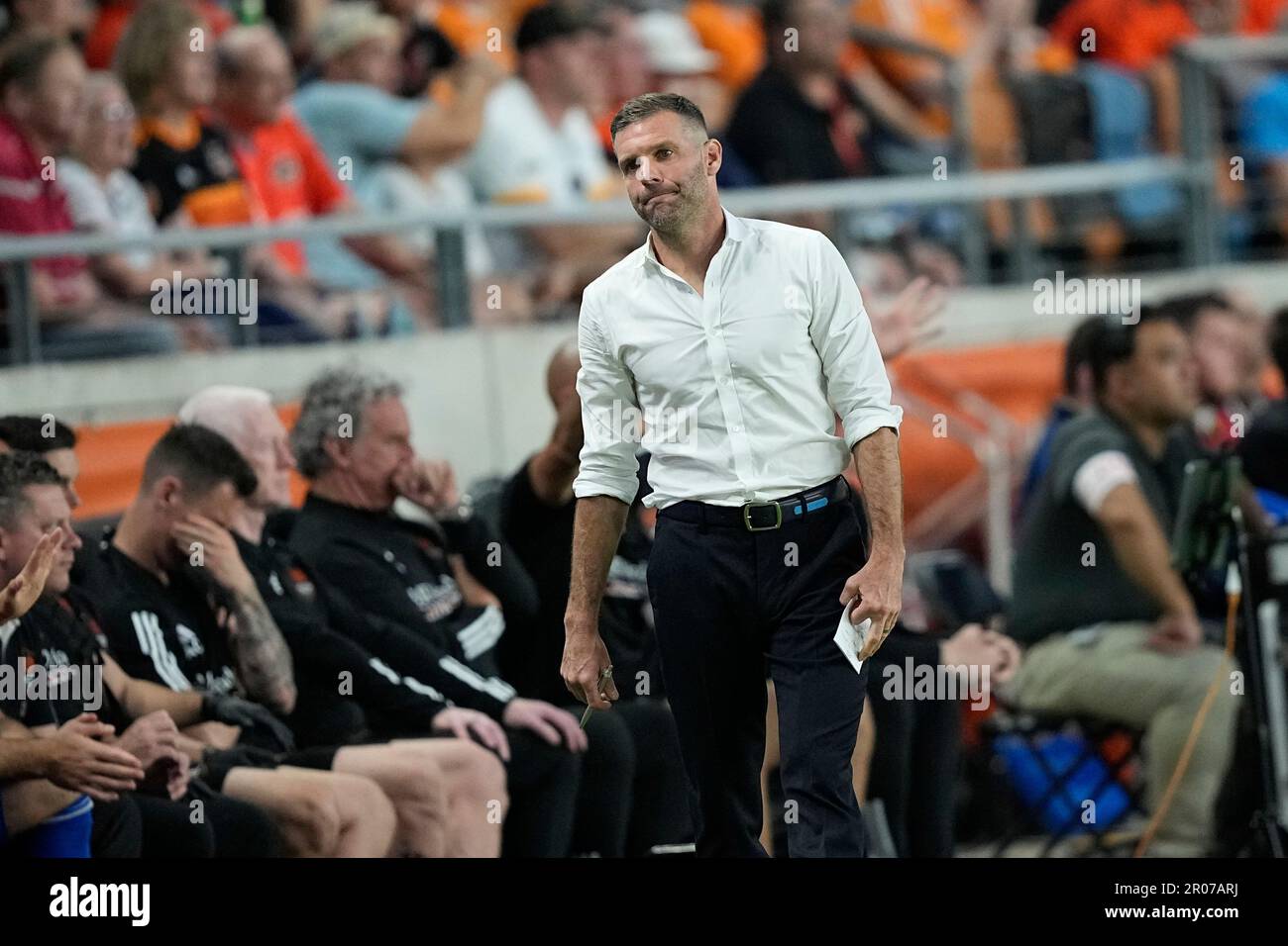 Houston Dynamo coach Ben Olsen walks along the sideline during the ...