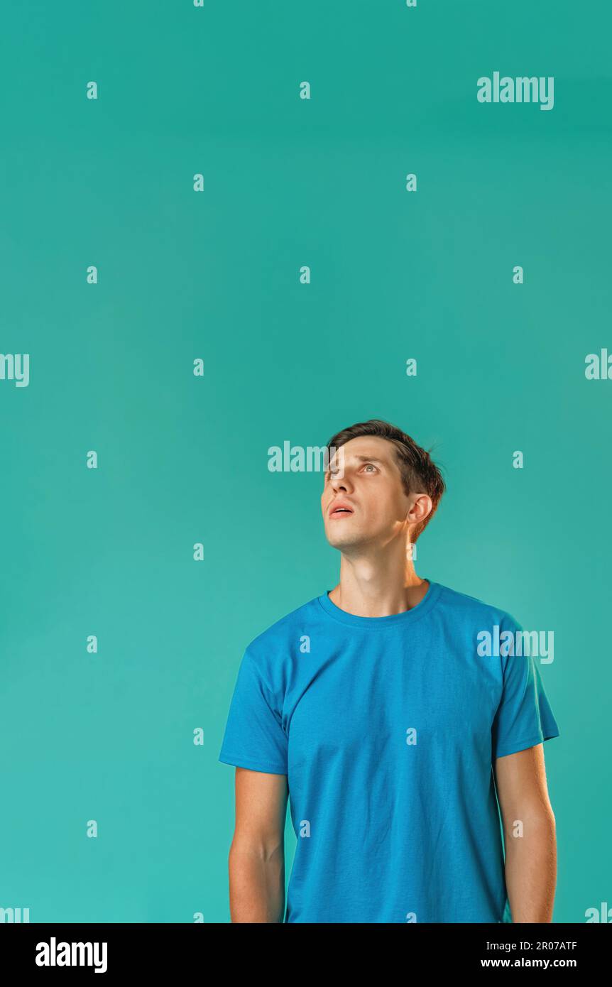 Curious man interesting advertising thoughtful guy Stock Photo - Alamy