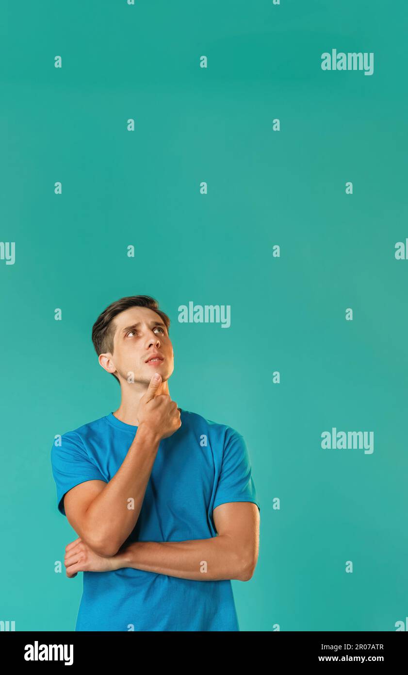 Puzzled man information background thoughtful guy Stock Photo - Alamy