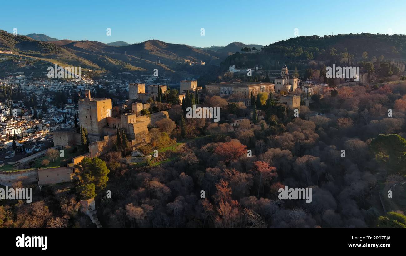 Aerial view of the famous Alhambra palace and fortress at sunset, in ...