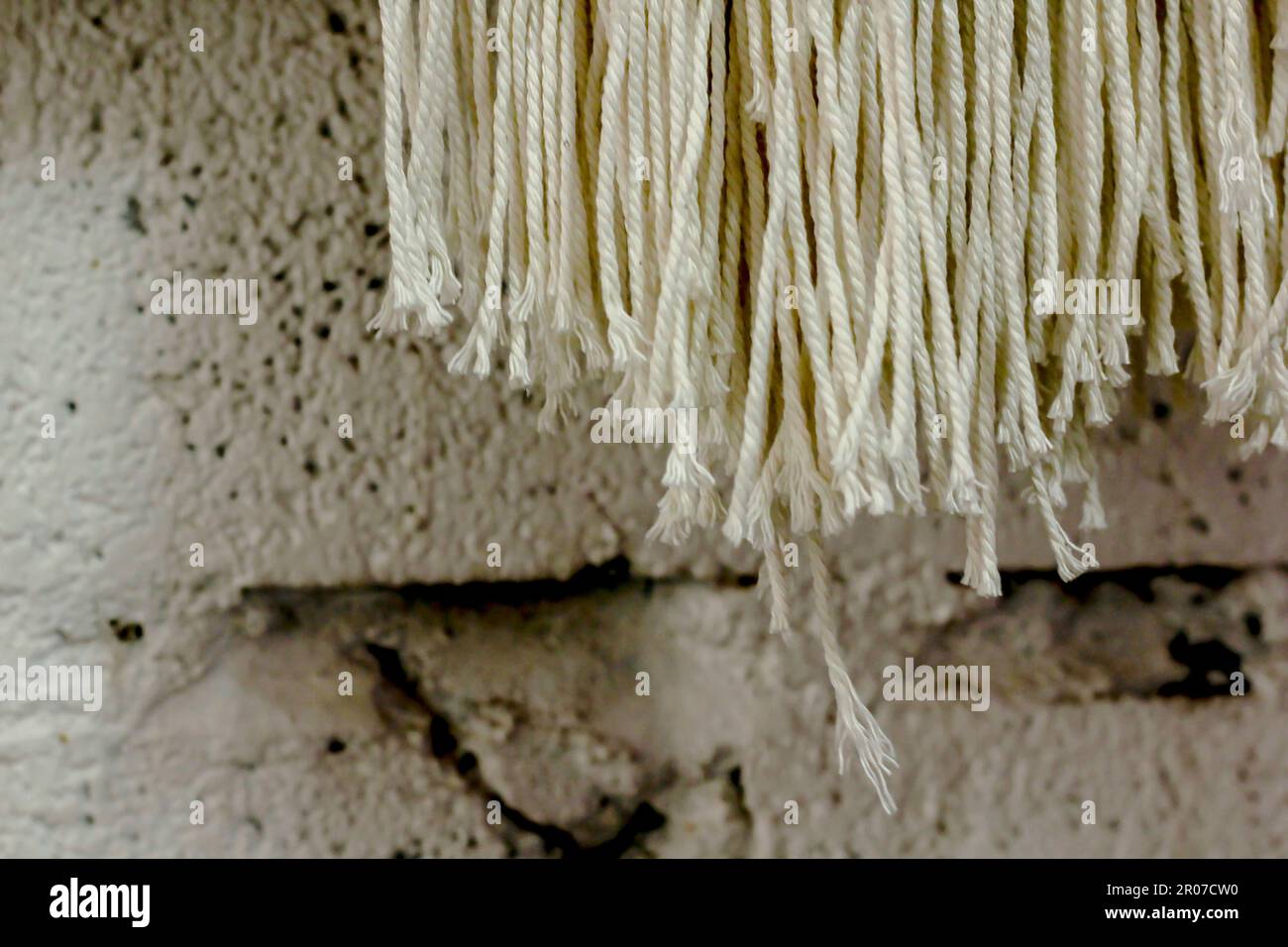 The end of the white string Stock Photo - Alamy