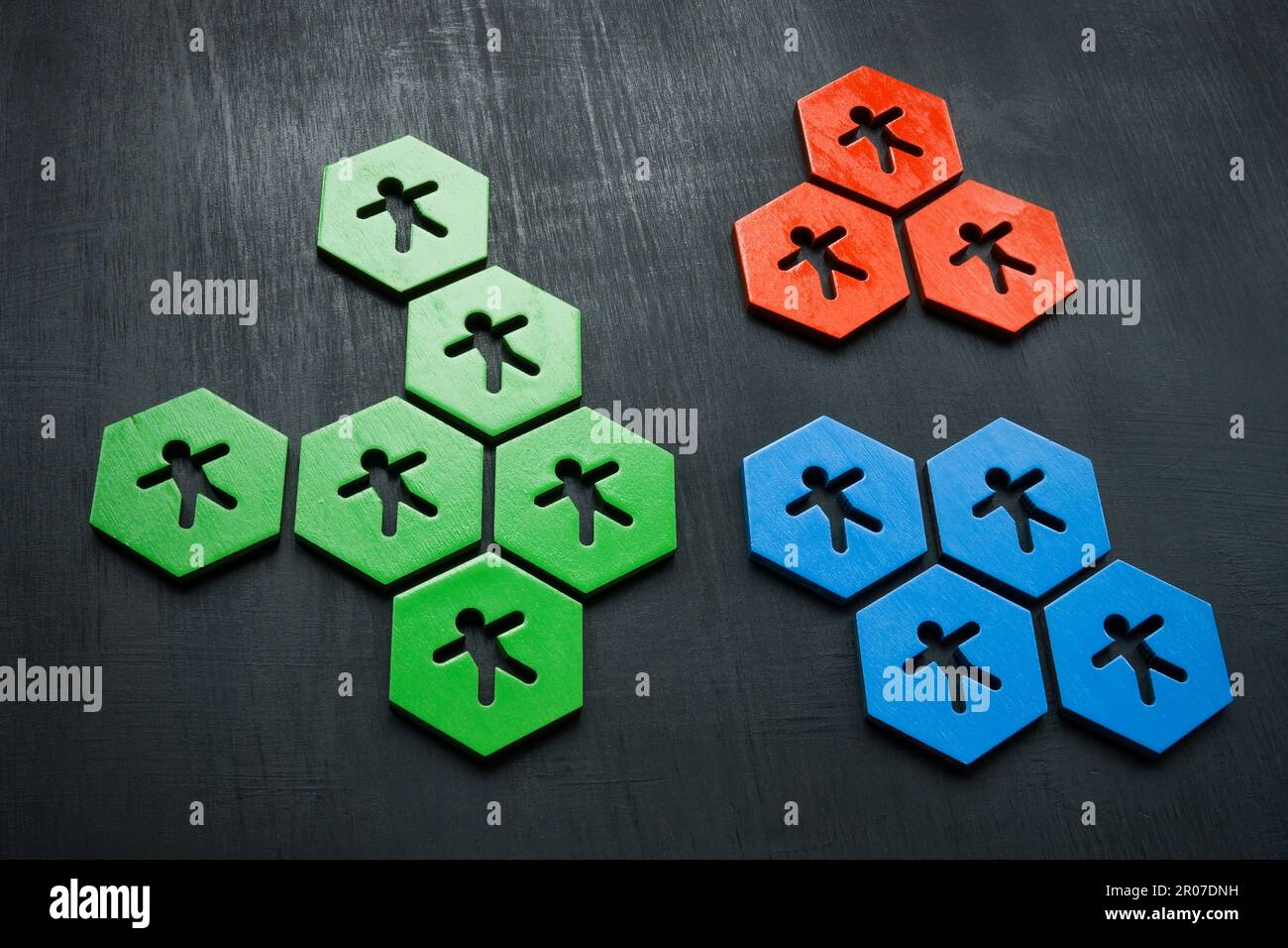 Groups of figures of the same color. Affinity Bias concept Stock Photo ...