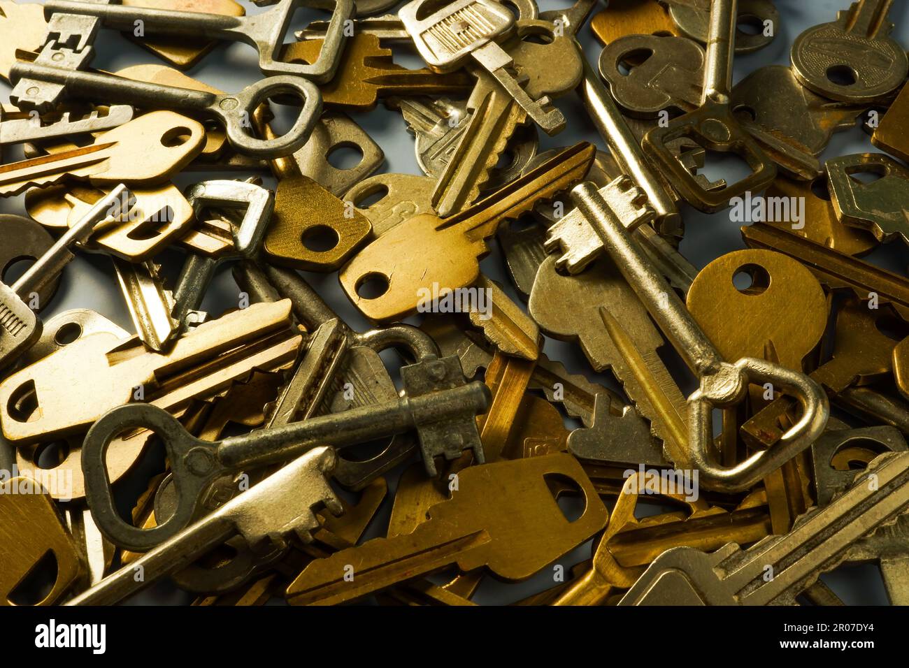 Lots of different metal keys. Conceptual background Stock Photo - Alamy