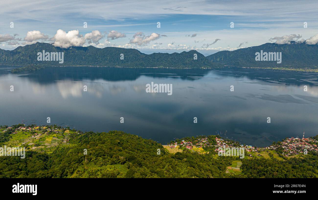 Top view of beautiful blue Maninjau lake and farmland in a volcano ...