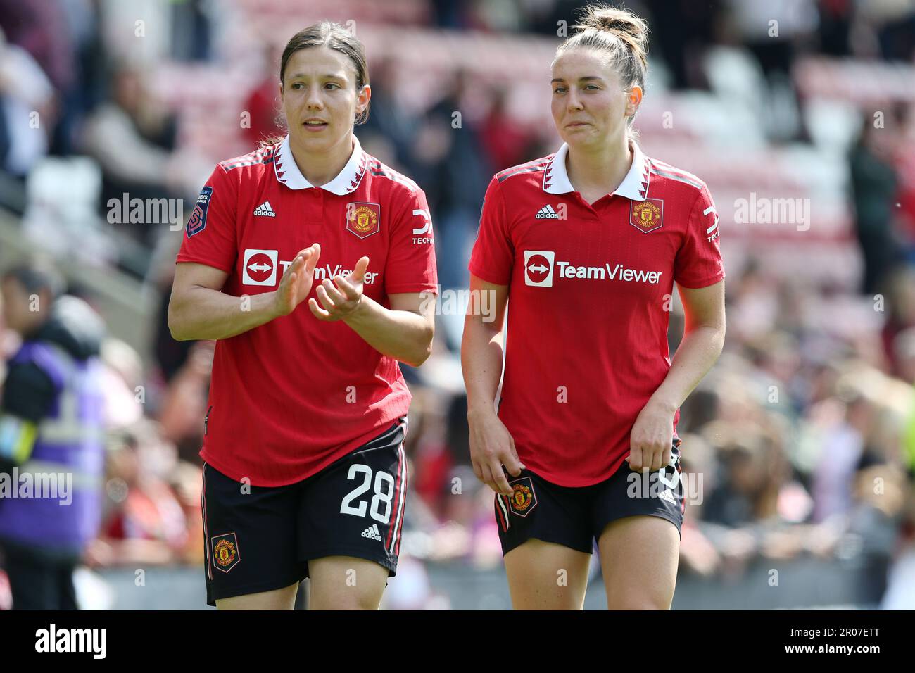 Manchester United's Rachel Williams and Vilde Boe Risa applaud the fans ...